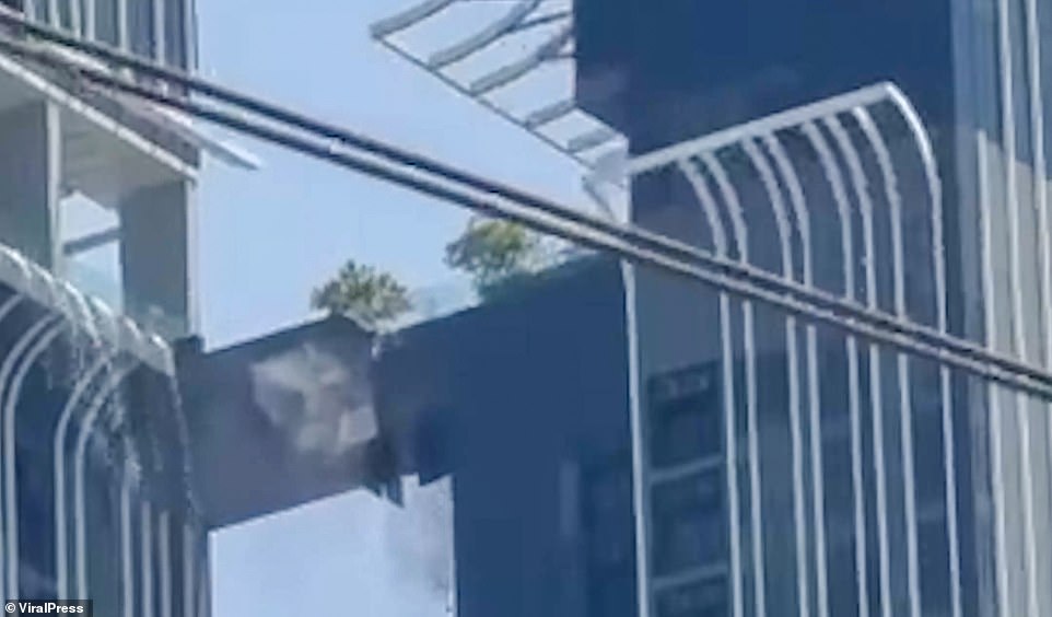 Shocking moment dad takes 600ft high leap during Thailand's earthquake