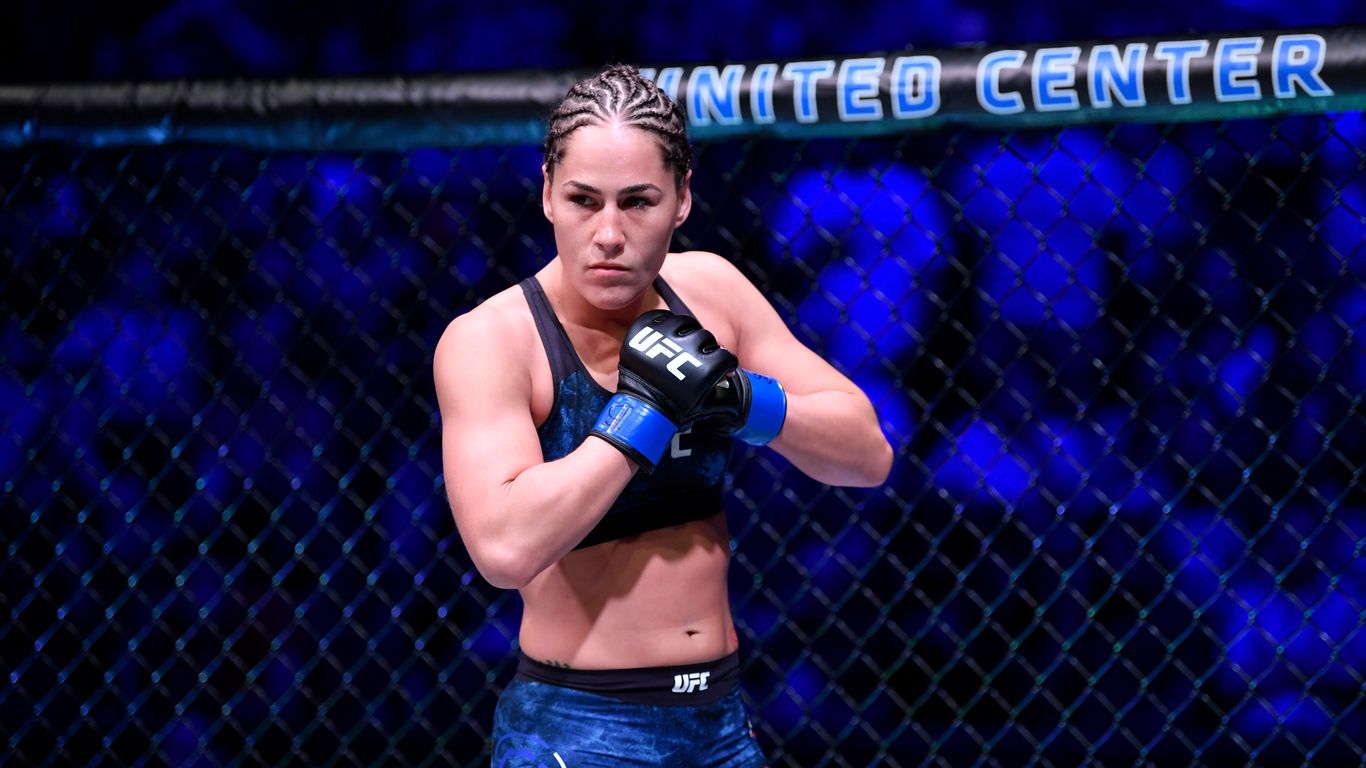 Jessica "Evil" Eye signs with Conor McGregor's bare-knuckle league
