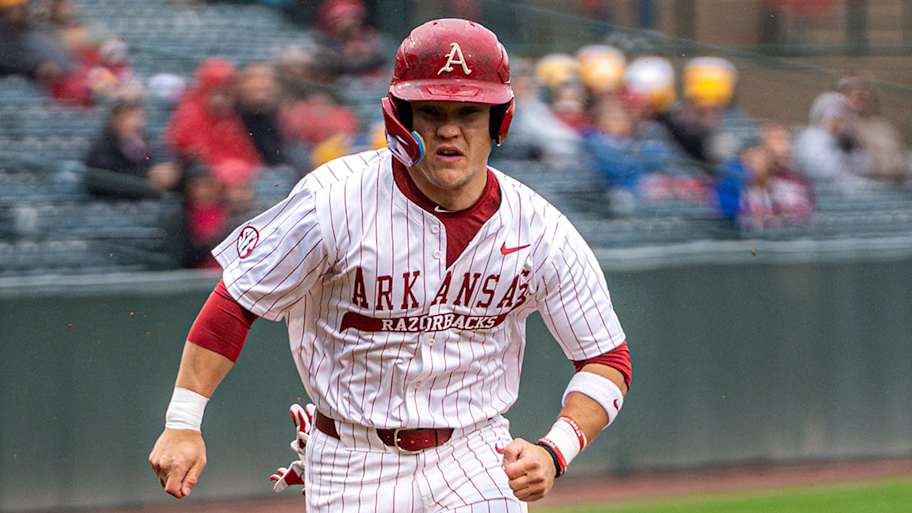 Kozeal filling void on the field, in dugout for Razorbacks