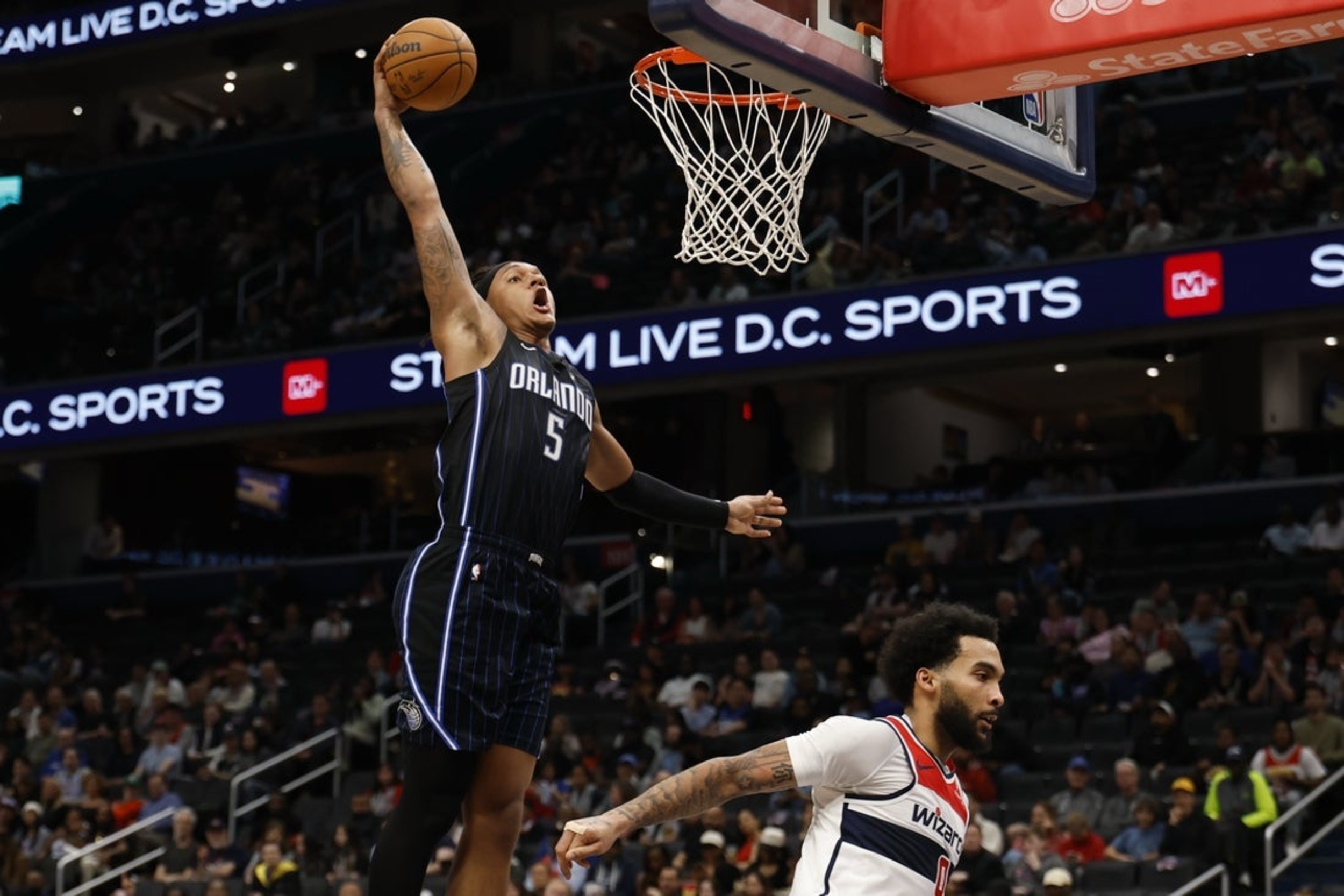 Magic, fighting for top play-in seed, host road-dominant Celtics