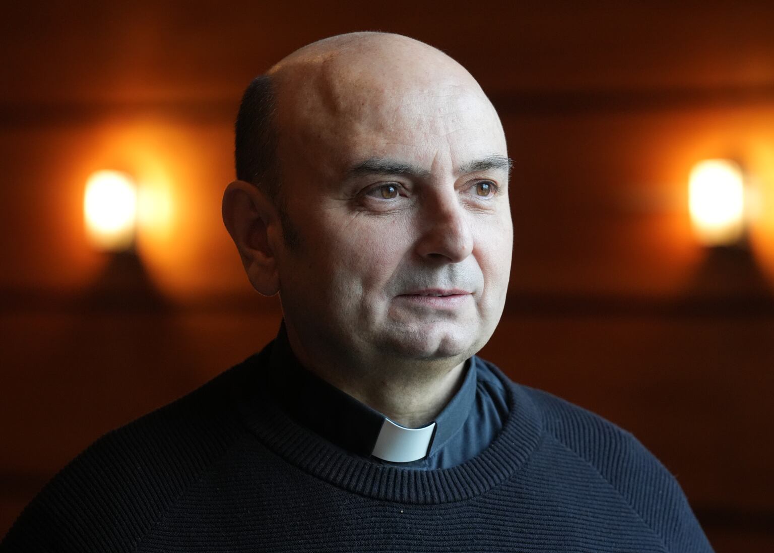 Gaza priest: ‘We are living in a giant cage’