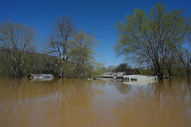 Death toll rises from devastating flooding