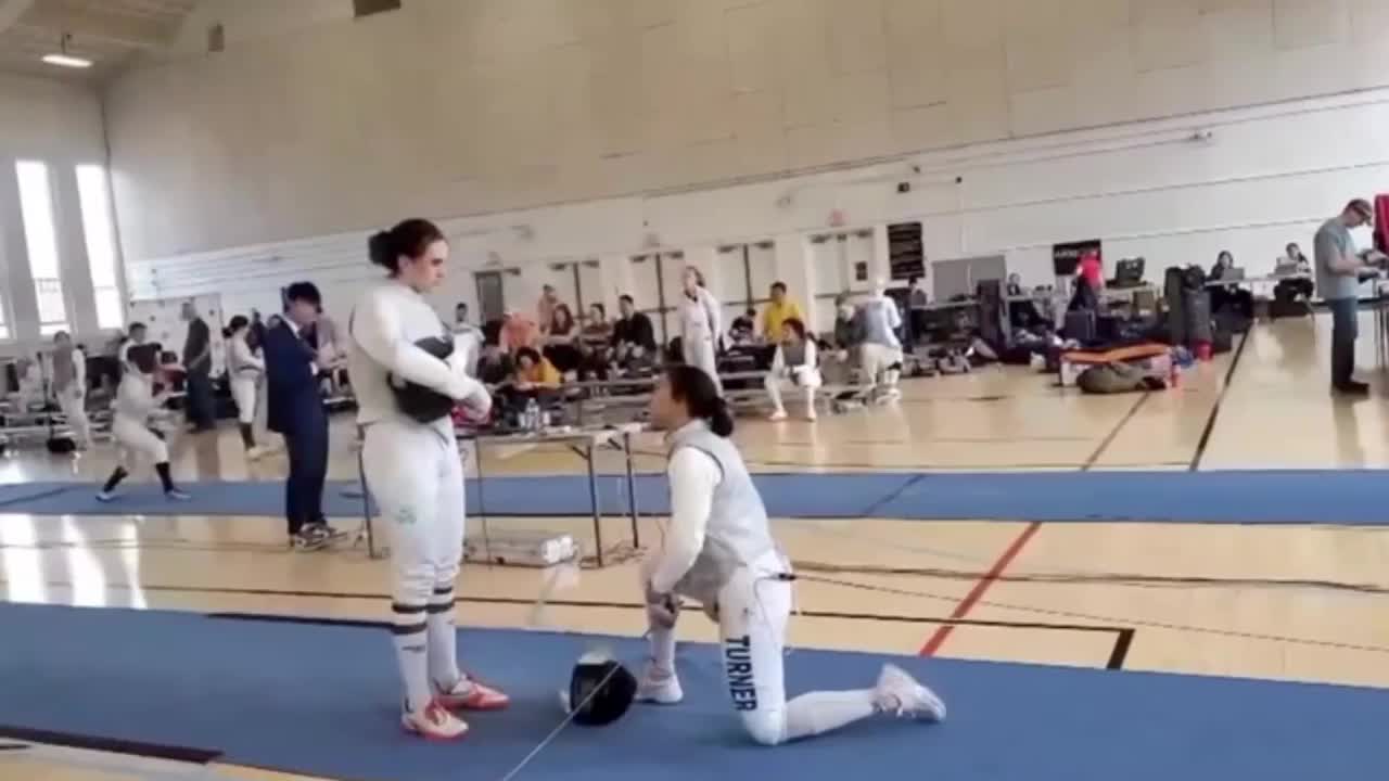 Fencing star receives award and cash sum after refusing to face trans ...