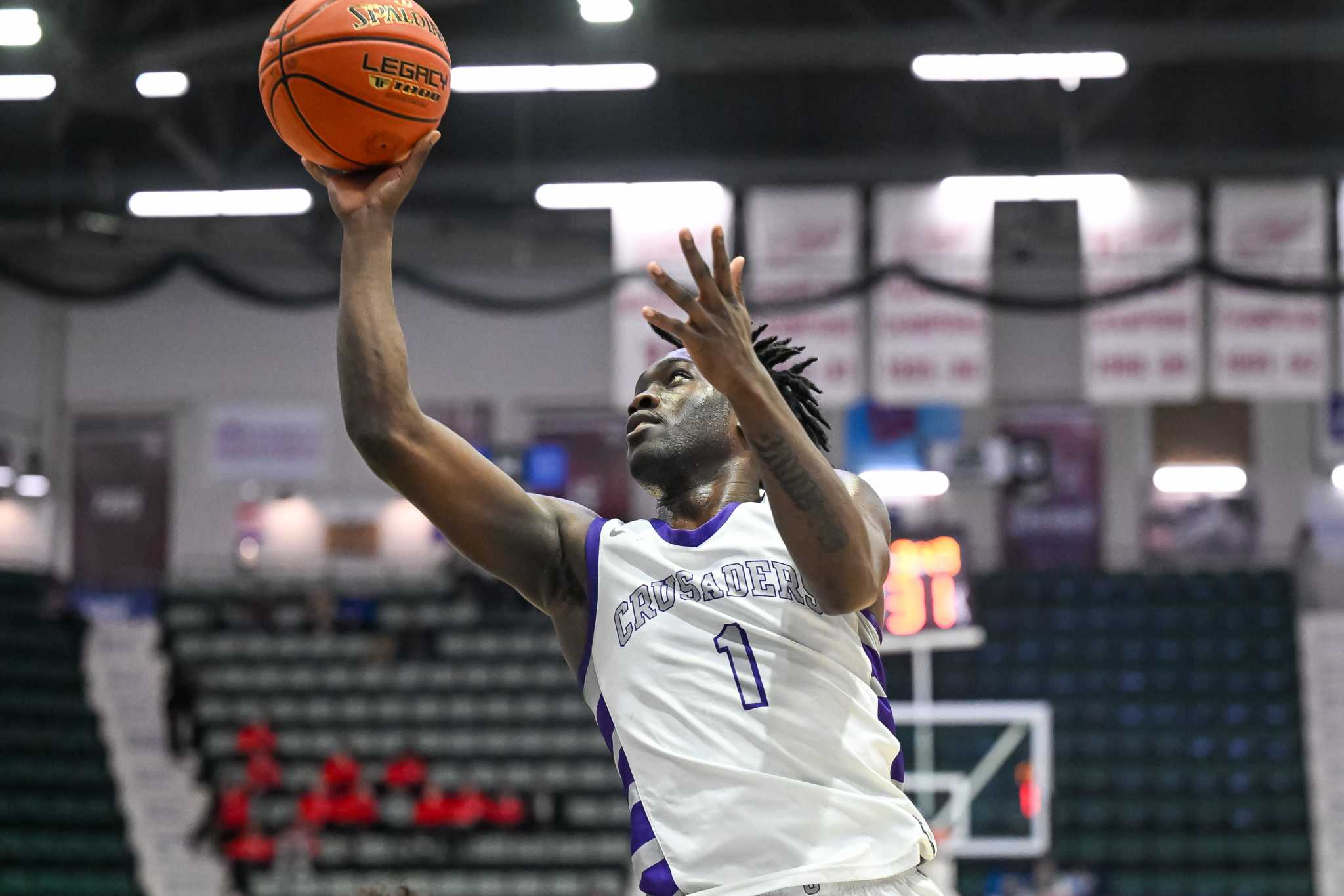 Former Catholic Central basketball star Darien Moore leads Brewster ...