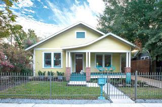 Budget Breakdown: A Butter-Yellow, Swooped-Roof Houston Home Gets a ...