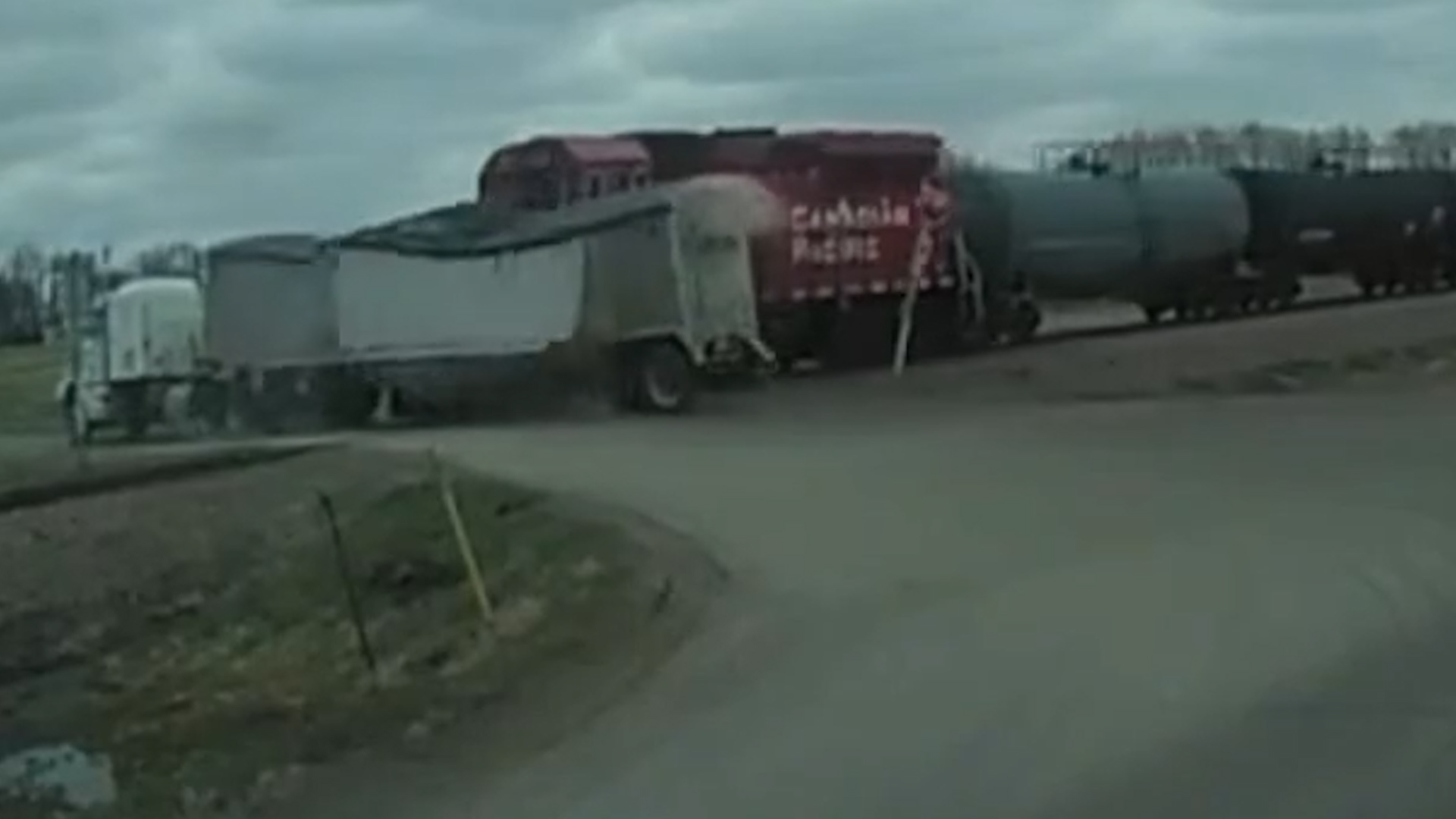 Shocking moment train hits semi-truck in Minnesota