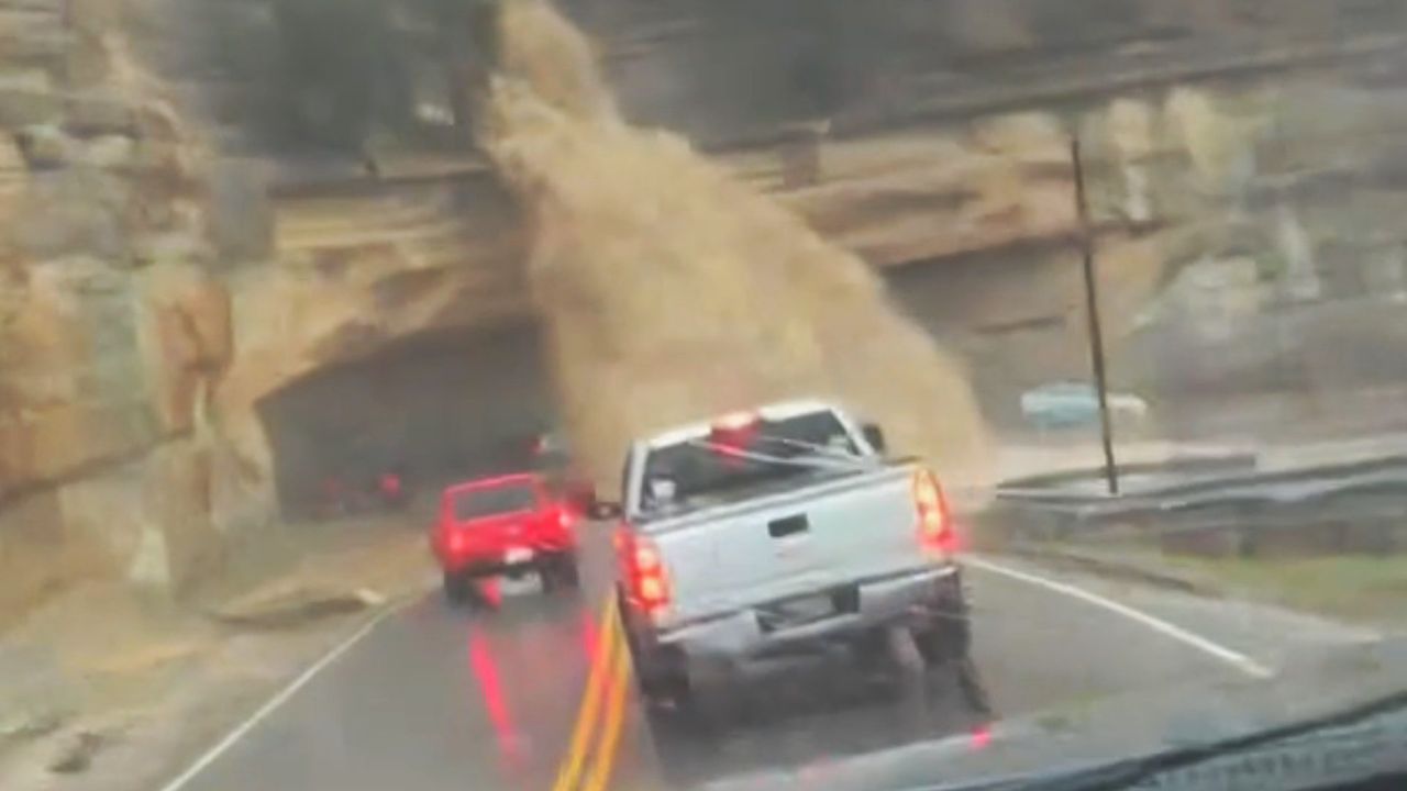 Flash flooding triggers raging waterfall on Indiana road