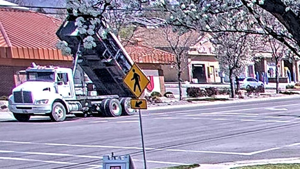 Dump truck driver taken into custody after hit-and-run crash with ...