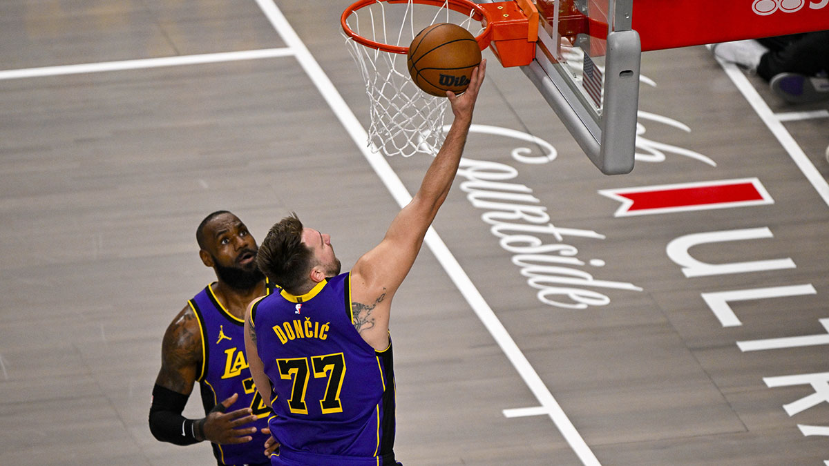 Lakers’ Magic Johnson celebrates Luka Doncic’s huge game vs. Mavericks