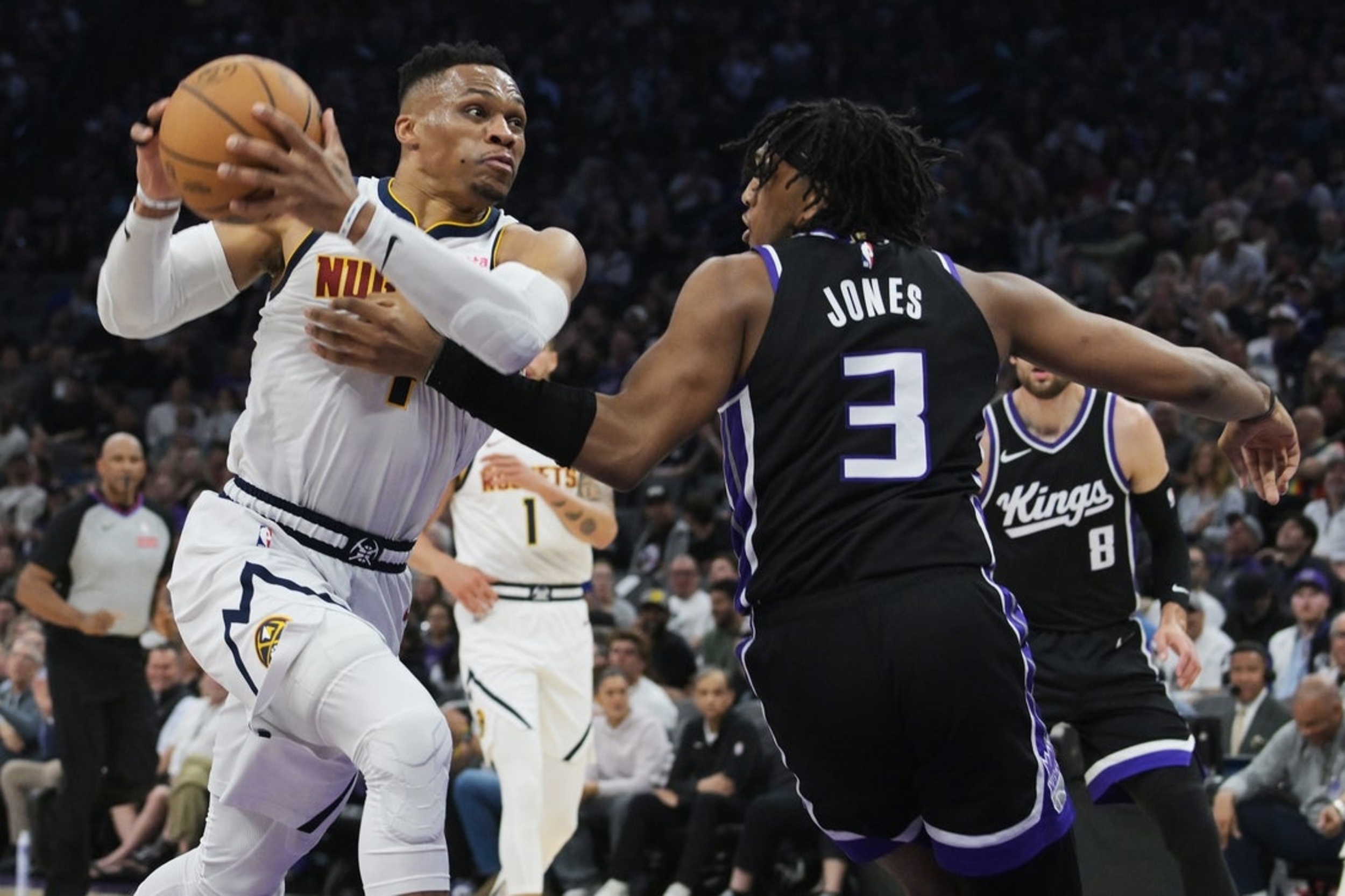 Nuggets hold off Kings to win interim coach's debut