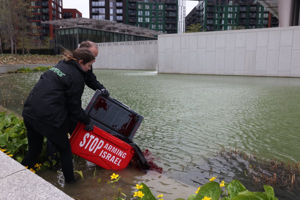 Activists disguise as delivery riders to pour blood-red dye poured US ...