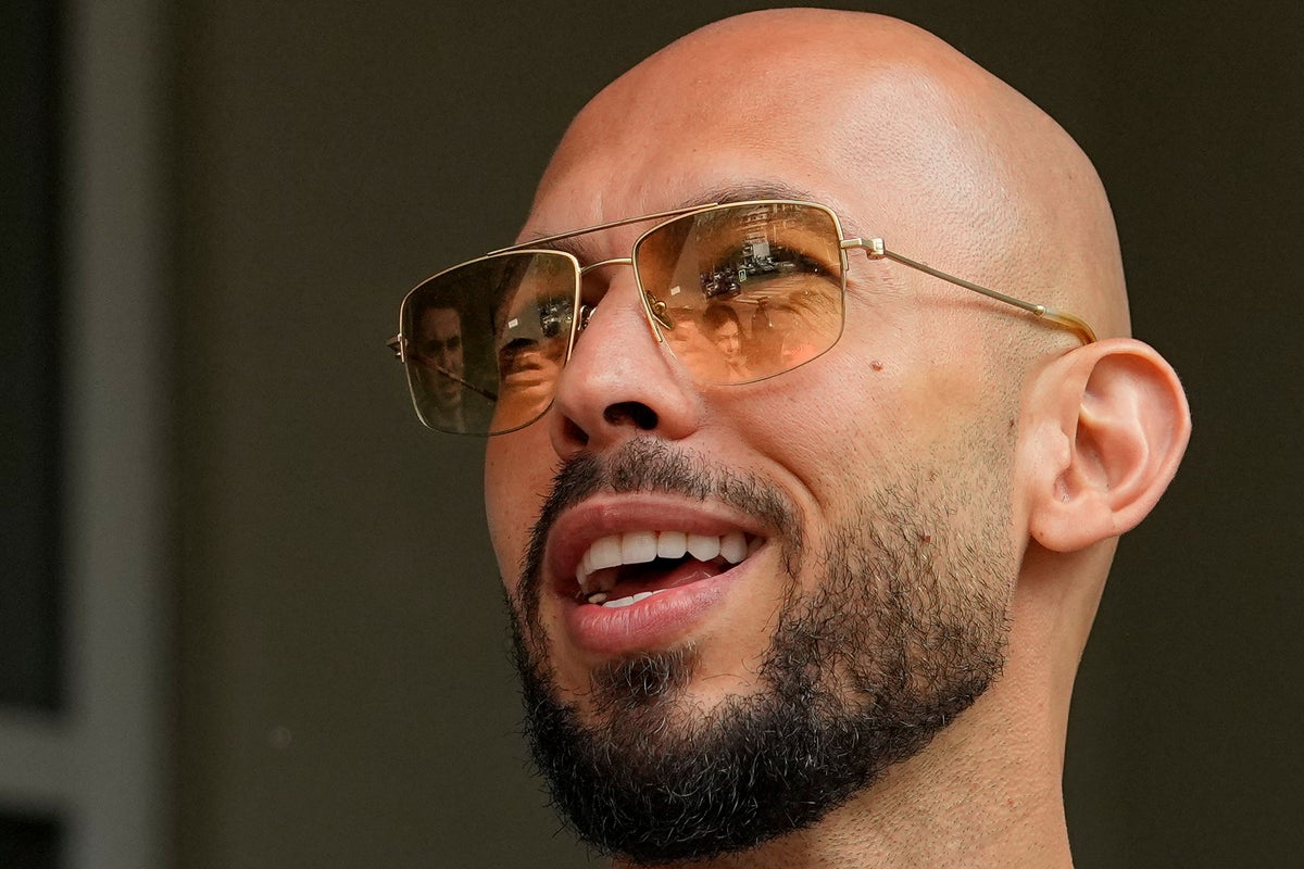 Andrew Tate accused of pointing gun in woman’s face, court documents say