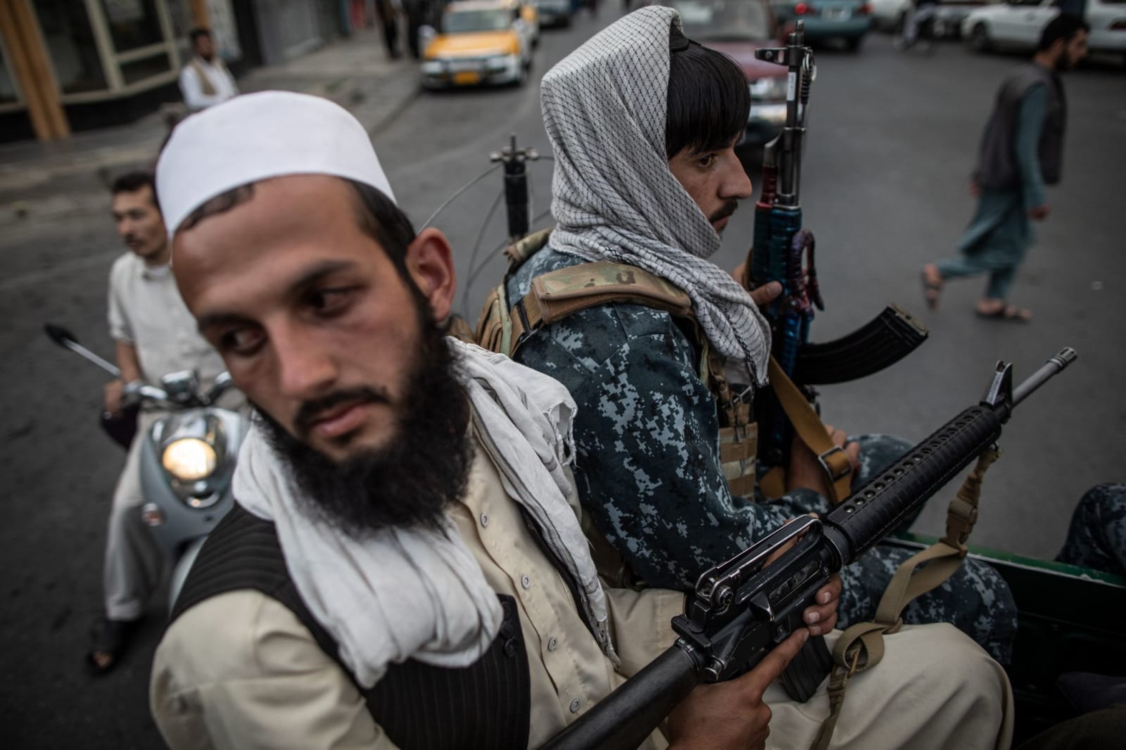 Afghan men's hair and beards are under scrutiny by Taliban, UN says