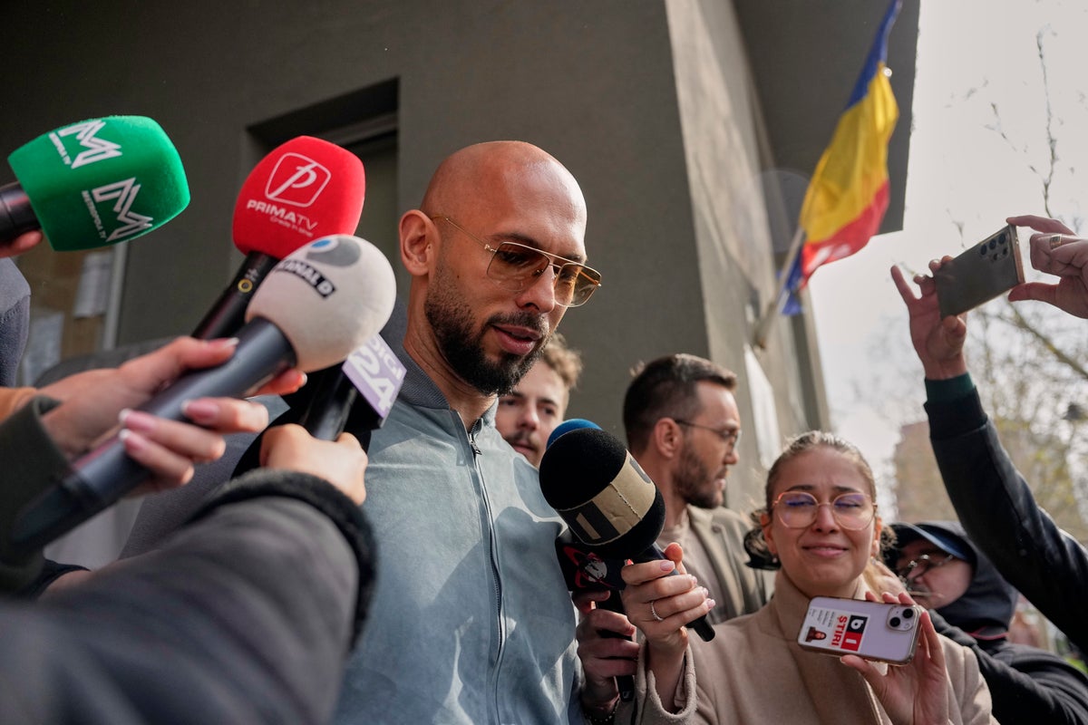 Influencer Andrew Tate accused of pointing gun at woman's face ahead of ...