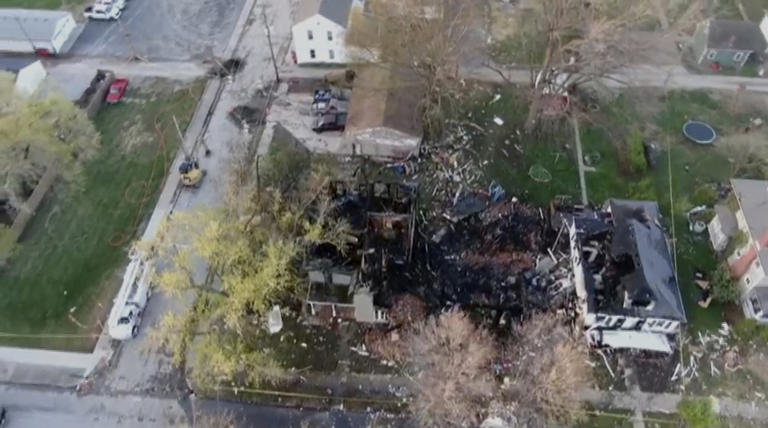Gas explosion levels a home in a Kansas City suburb after a gas main is hit