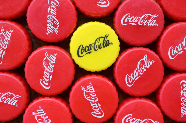 What does the yellow cap on Coca-Cola bottles mean?