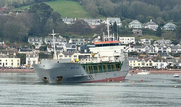 Massive ship stuck in Devon harbour after running aground