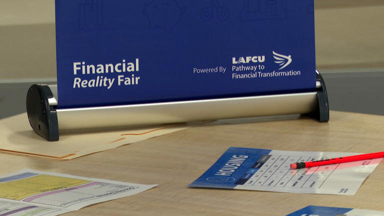 Students participate in an interactive financial reality fair