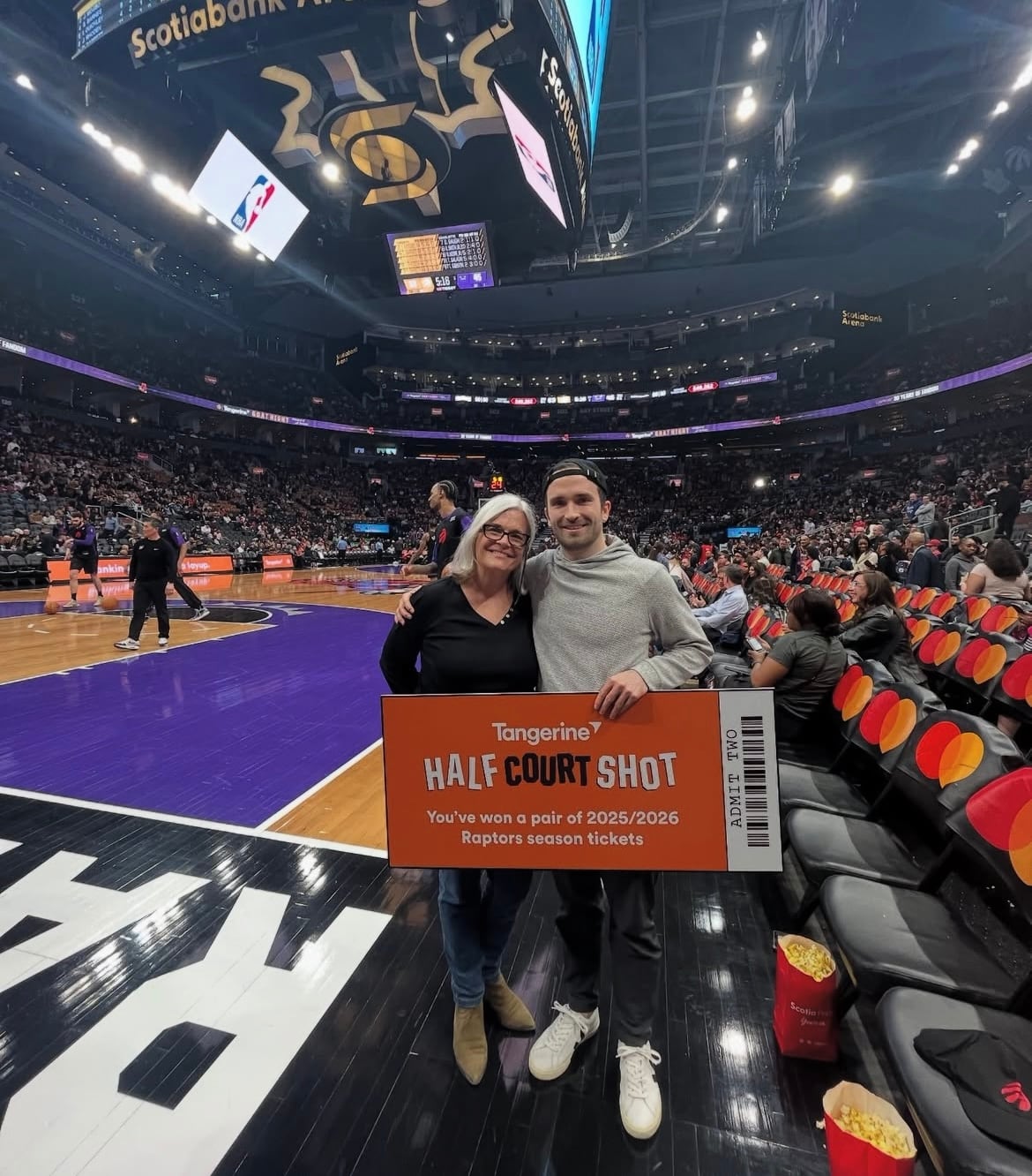 This Toronto Raptors fan won season tickets thanks to a very lucky half ...