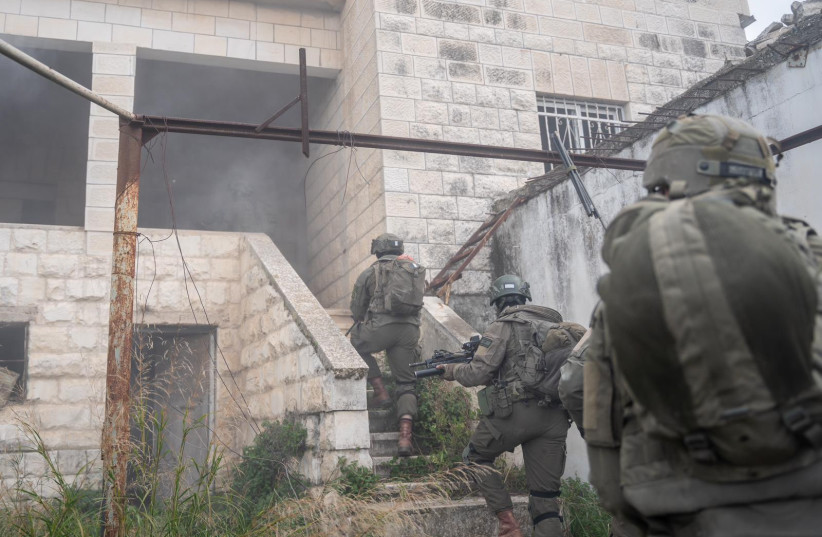 Four Palestinians indicted for ax attack, attempting ramming