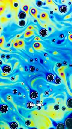 This is not CGI - incredible footage of a soap bubble under the microscope!