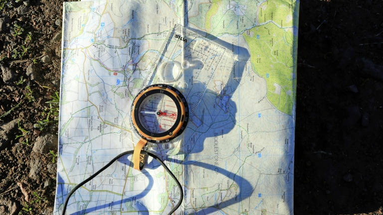 How to use a compass and map to navigate