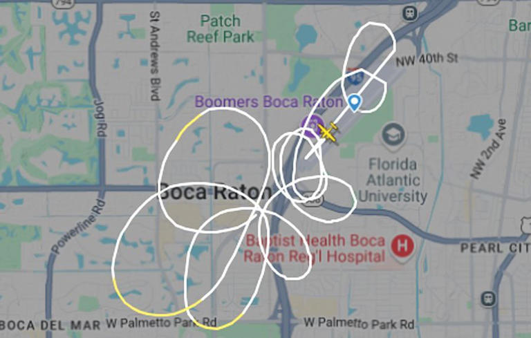 Three people dead after plane crashes onto highway in Boca Raton, Florida