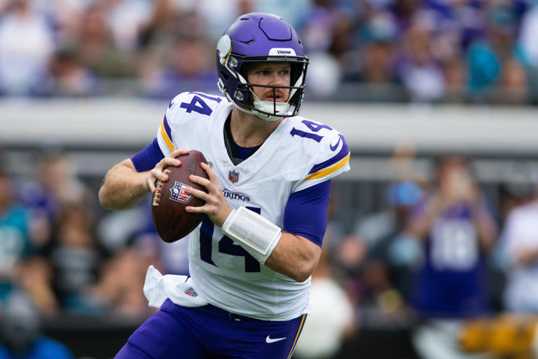 Sam Darnold connects with Cooper Kupp at Seahawks practice