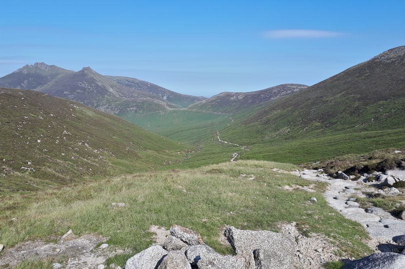 Walker rescued and taken to hospital after falling while descending ...
