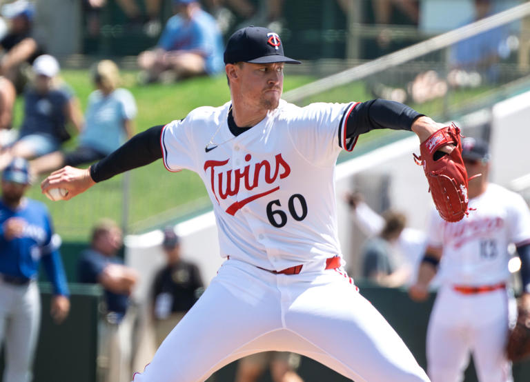 Twins designate right-hander for assignment