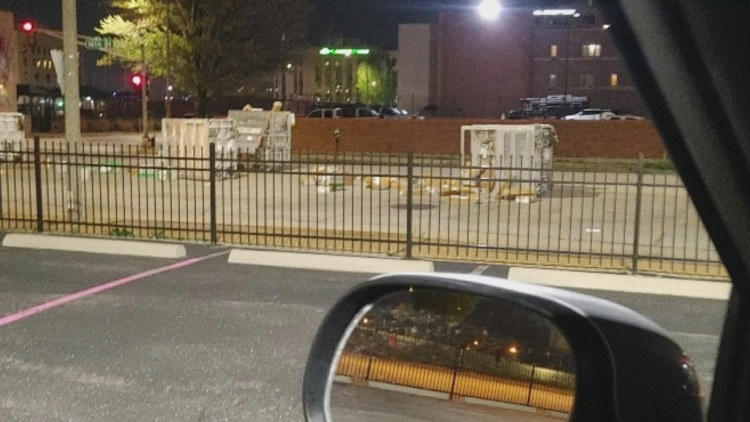 Footage shows pallets of mail falling off USPS truck running a red ...