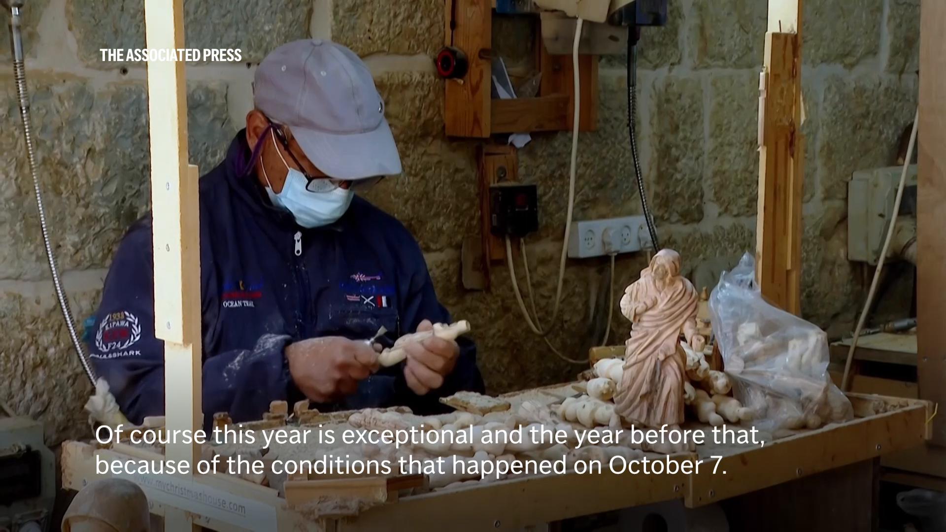 Workshops empty, Bethlehem carvers fret over second Easter with no tourists due to Israel-Hamas war