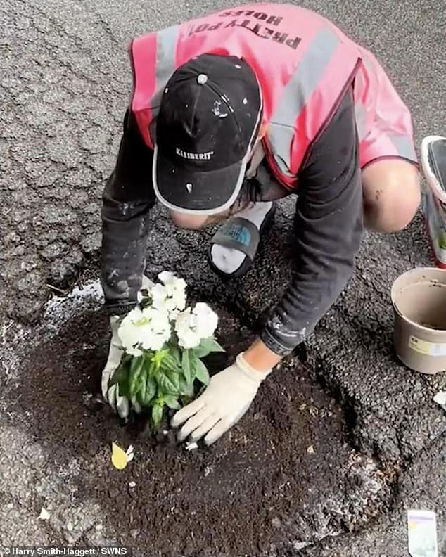 Nigel Farage helps vigilante gardener fill in 'monstrous' potholes