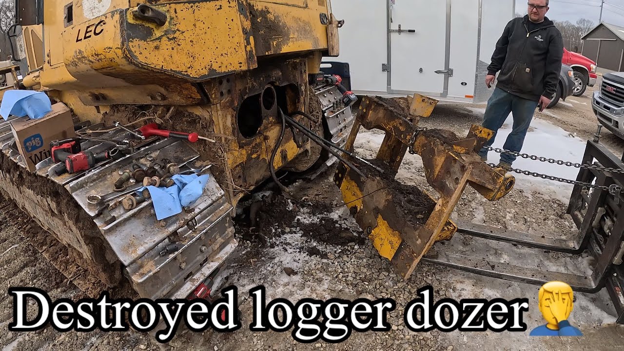 Major destruction on a Deere 700J logging dozer. Broken parts ...