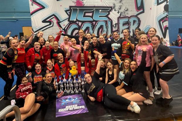 Cheerleading group joyous after winning bid to compete at Florida World ...