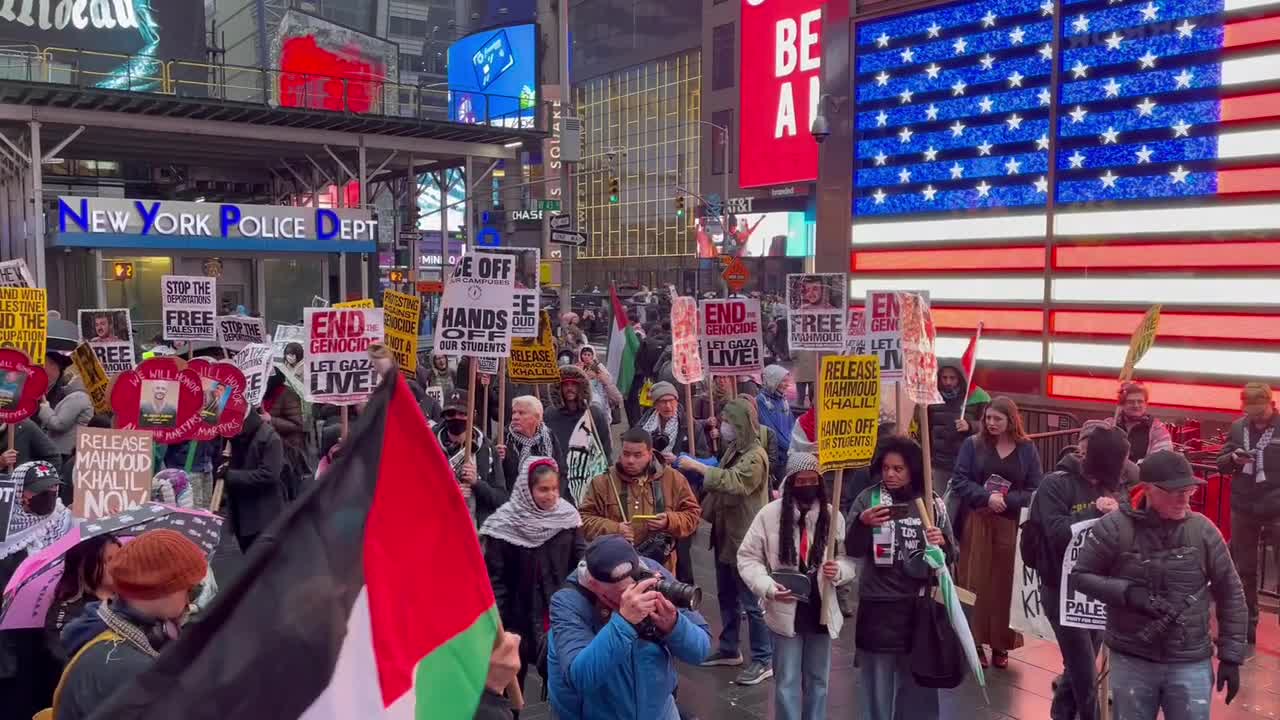 Demonstrators protest in Times Square following court’s ruling allowing ...