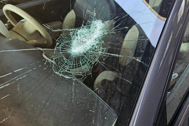 Man left 'shocked and disgusted' after brick 'dropped onto windshield ...