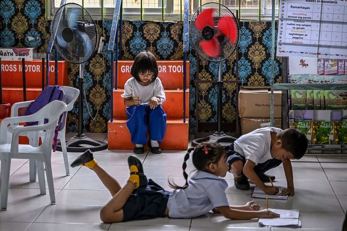 Early holiday, more fans: Philippines Schools adapt to climate change