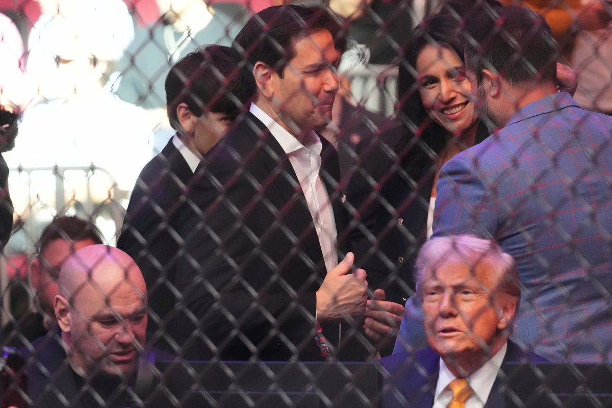 Donald Trump given standing ovation cageside at UFC fight