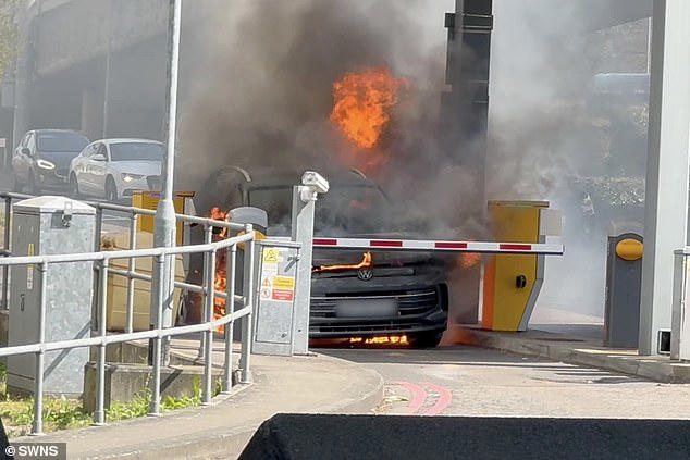 Moment car erupts into flames at Gatwick Airport car park