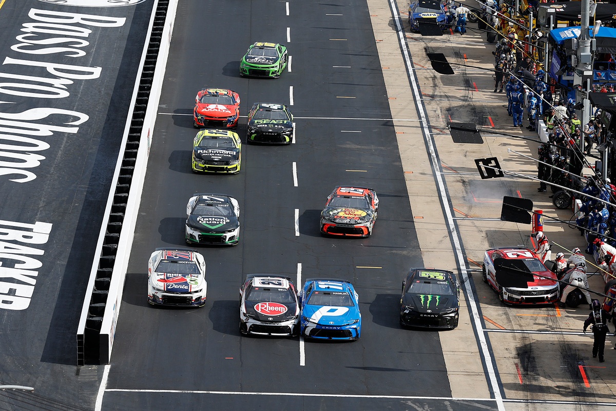 Video: NASCAR crew member narrowly escapes runaway wheel in pit scare