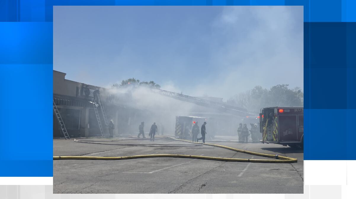 Multiple Huntsville Fire and Rescue units responding to structure fire