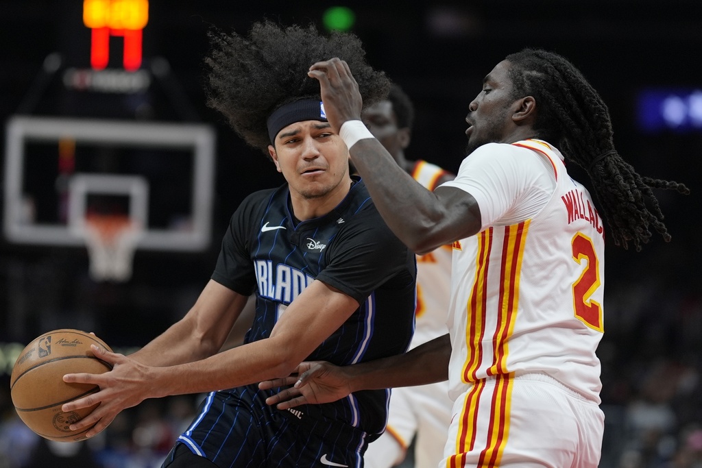 Keaton Wallace logs first career triple-double as Hawks beat Magic 117-105 before play-in rematch