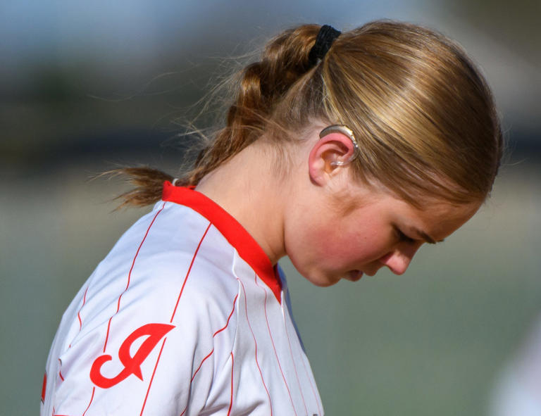Hearing impairment doesn't slow this small-school softball pitcher. She ...