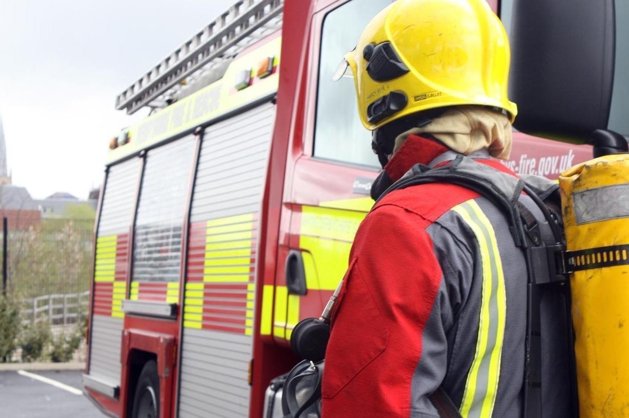 People urged to stay away as 8 fire engines tackle garage fire which has spread on Priory Close ...