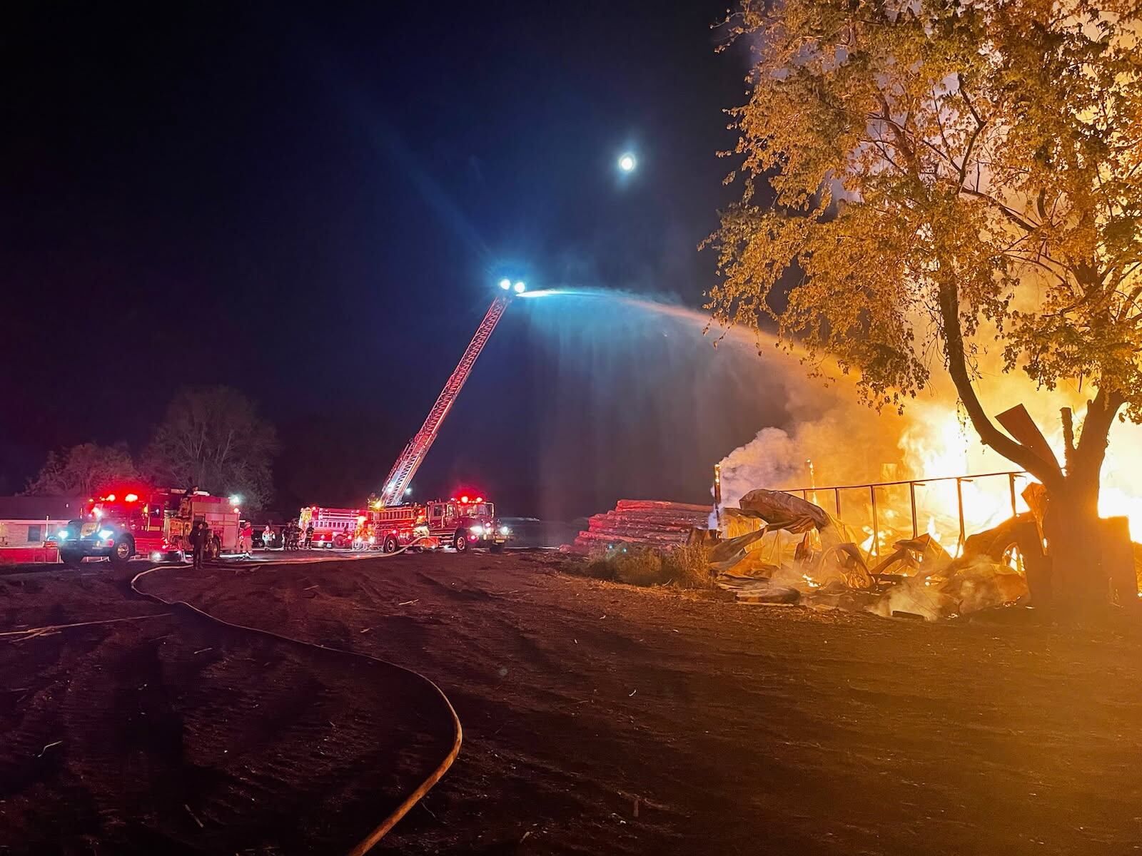Fire crews battle large fire at a sawmill in Lawtey