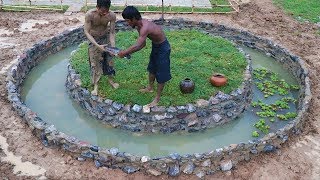 Stone and Clay Shaped Into a Stunning Fish Pond Built by Hand in Just 2 ...