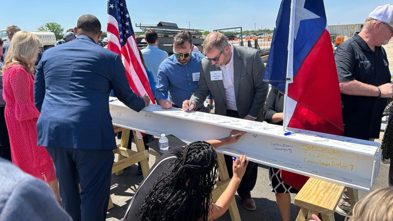 Major milestone: University Health hosts beam-signing ceremony for ...