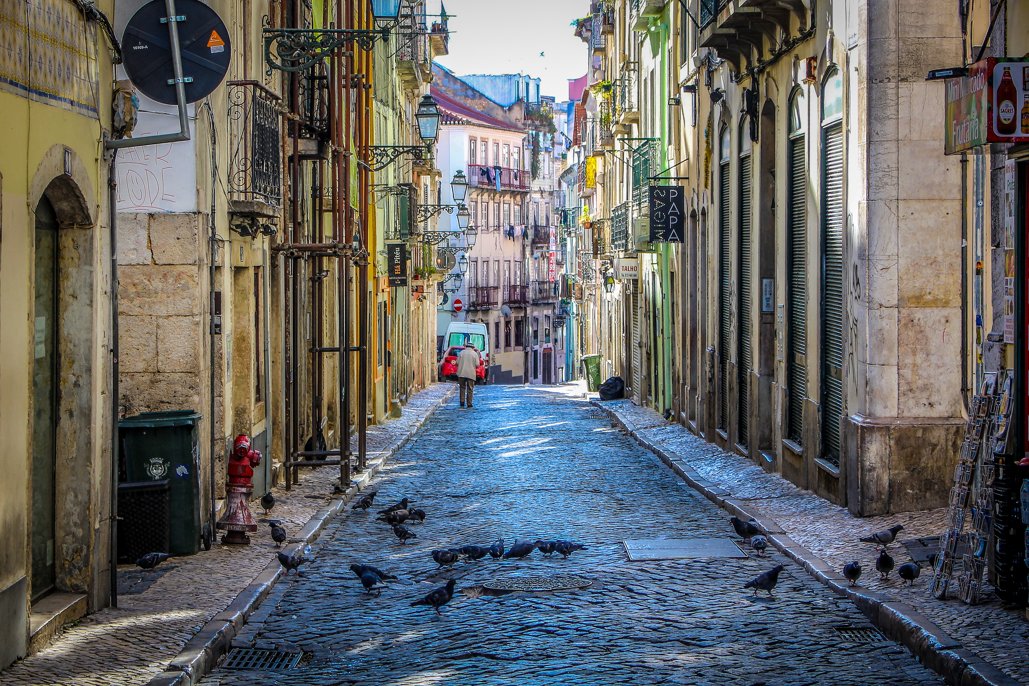 Where to go in Lisbon if you love cobblestone streets and hidden alley ...