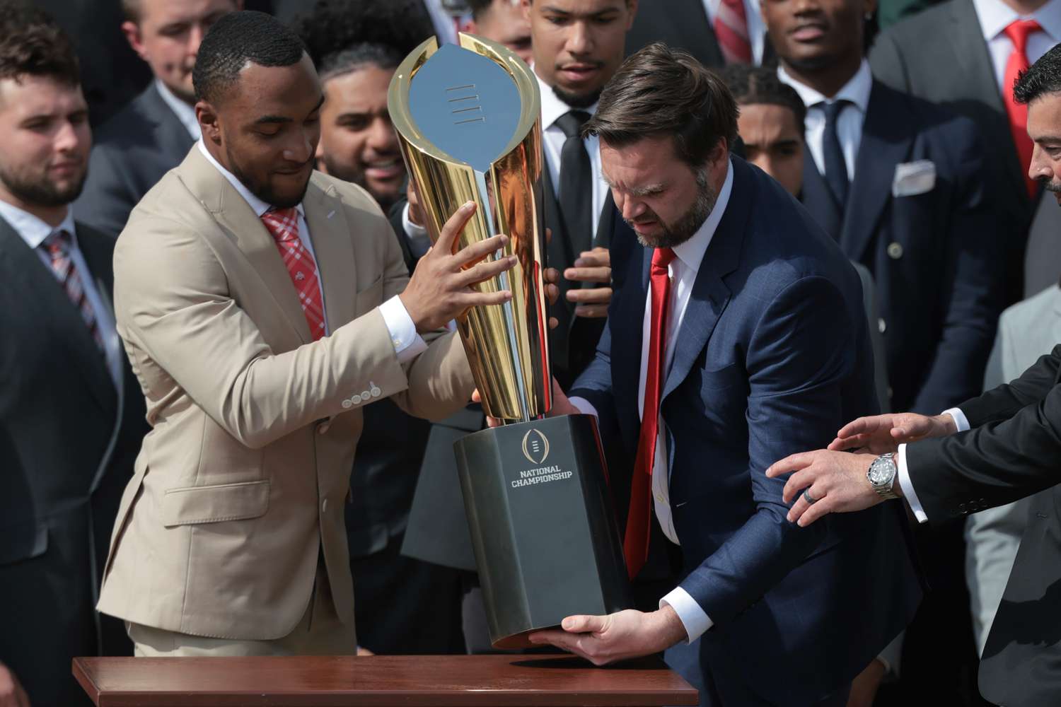 J.D. Vance Drops College Football Championship Trophy During White ...